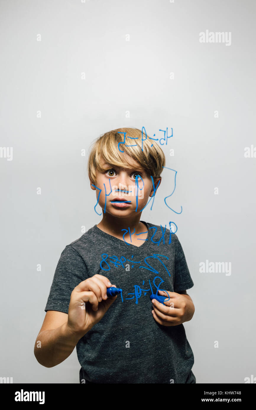 Child Boy Looking At Camera Staring High Resolution Stock Photography ...