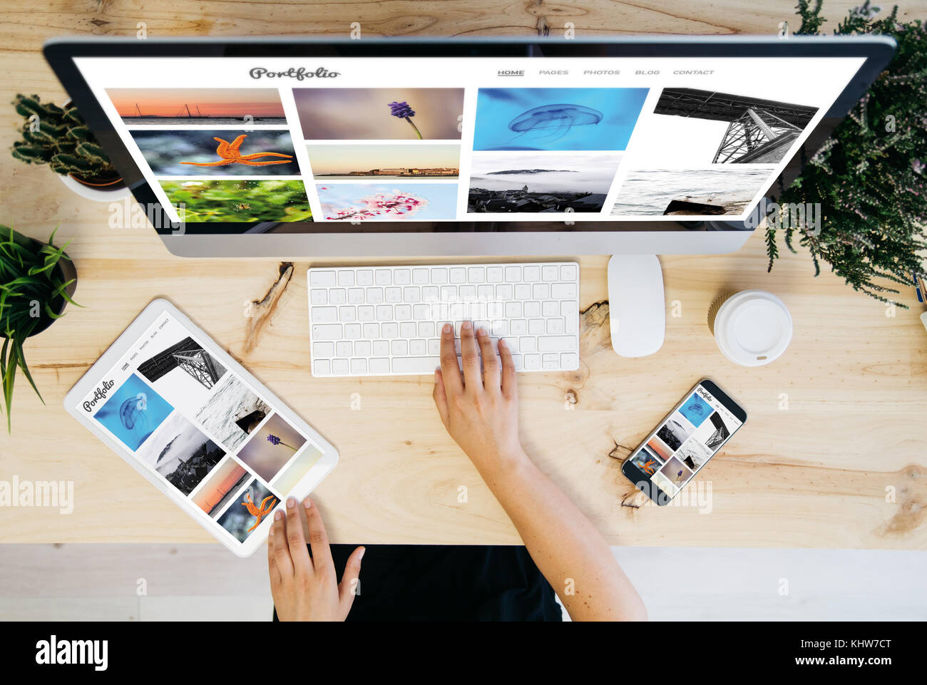 overhead desktop with photo portfolio on devices screen Stock Photo - Alamy
