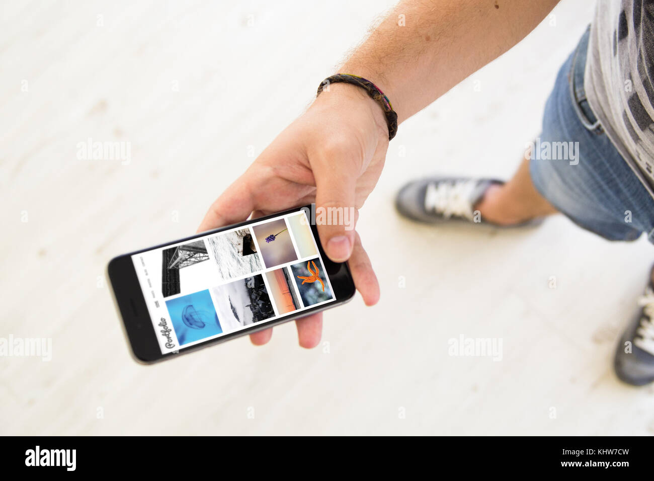 closeup of male hand using white screen smartphone portfolio Stock ...