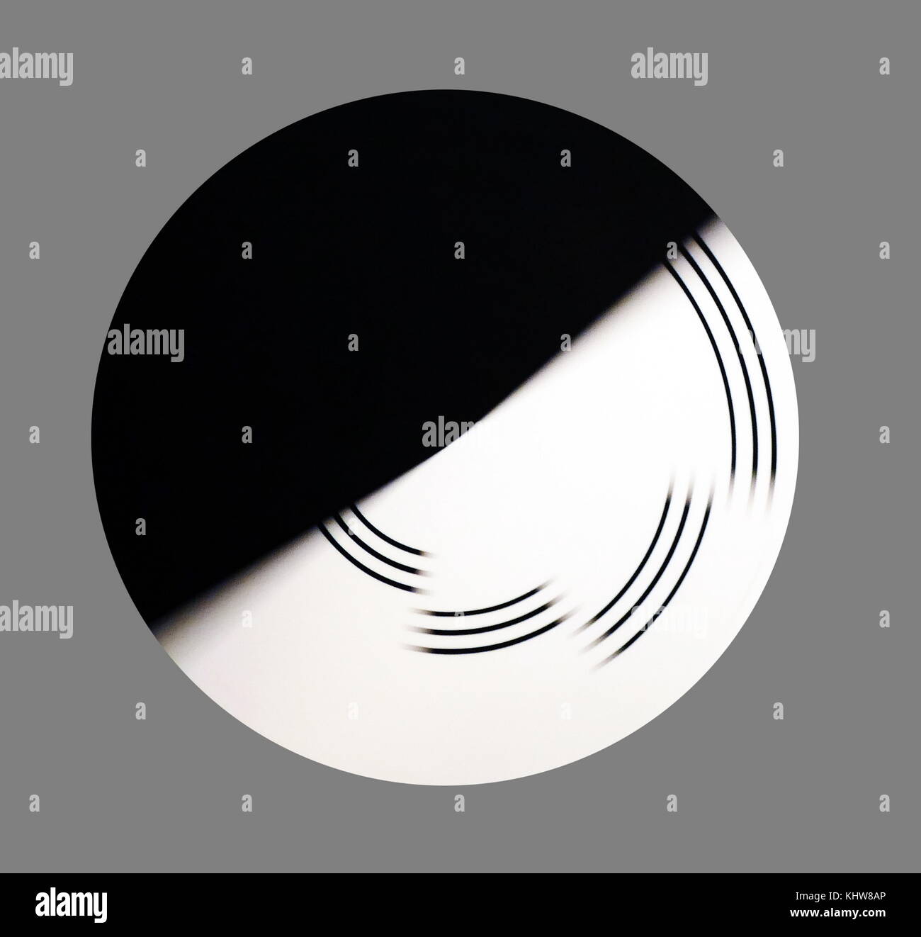 Benham's Disk (Benham's Top) a top painted with the pattern shown. When ...