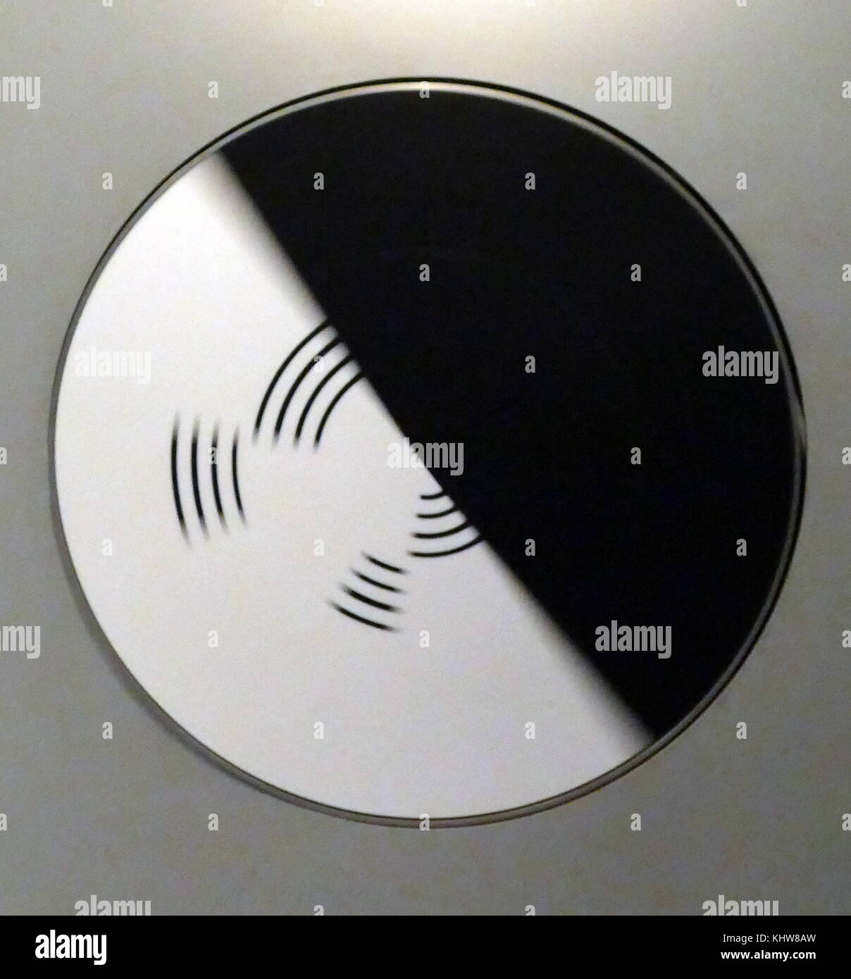 Benham's Disk (Benham's Top) a top painted with the pattern shown. When ...