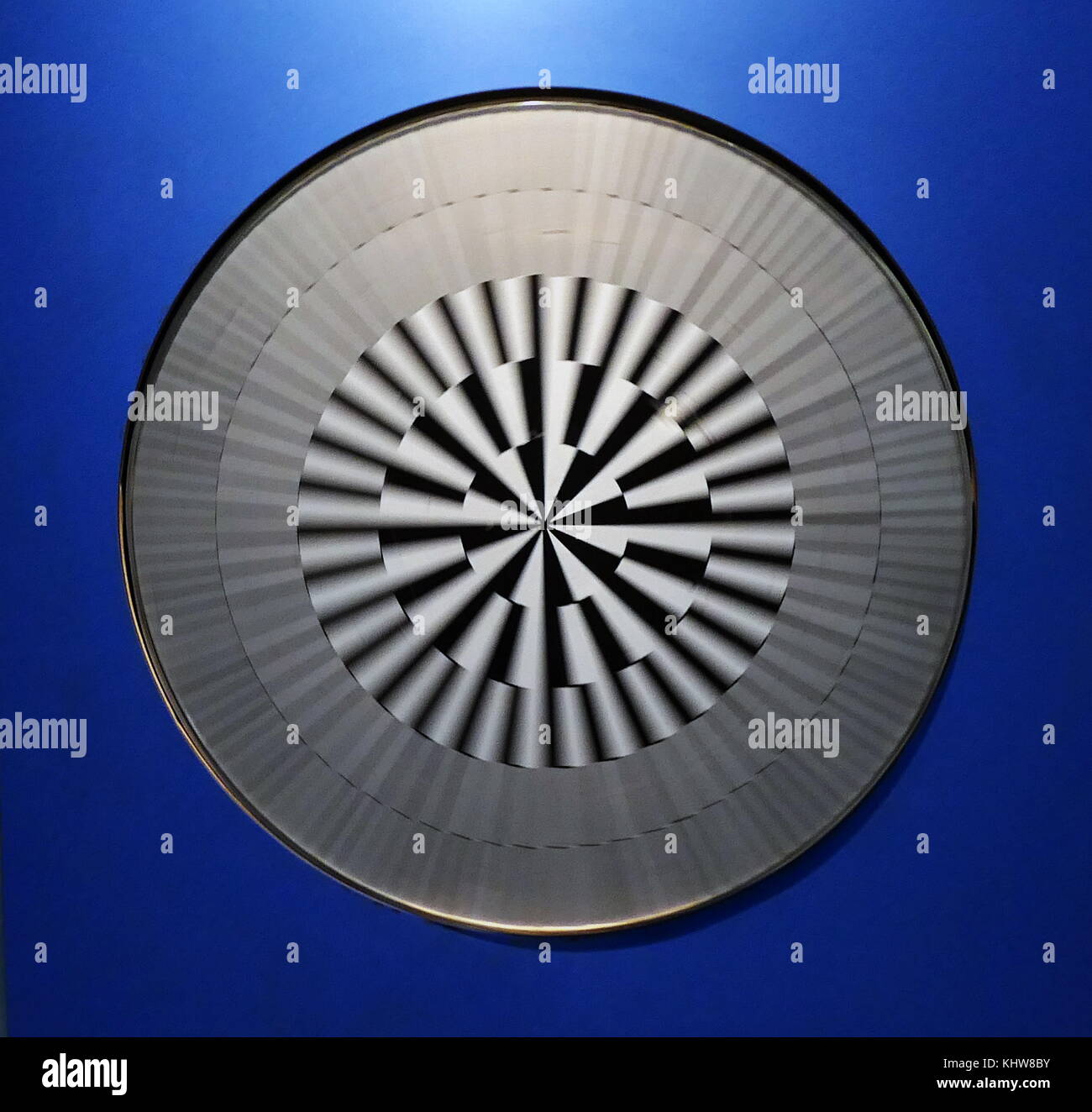 Benham's Disk (Benham's Top) a top painted with the pattern shown. When ...