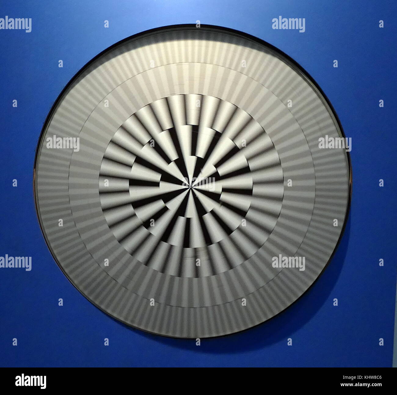 Benham's Disk (Benham's Top) a top painted with the pattern shown. When ...