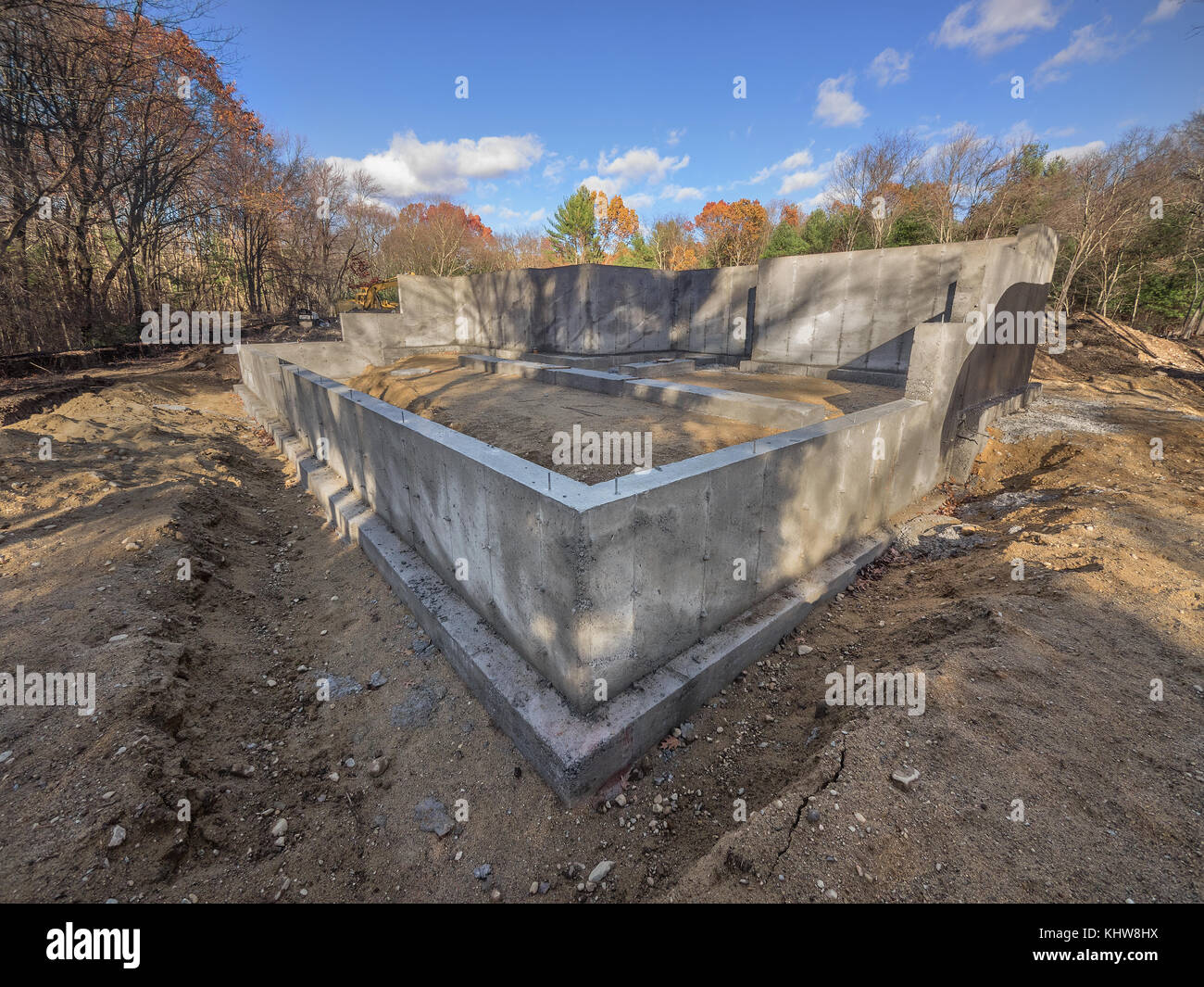 New concrete house foundation on a lot in the city suburbs Stock Photo ...