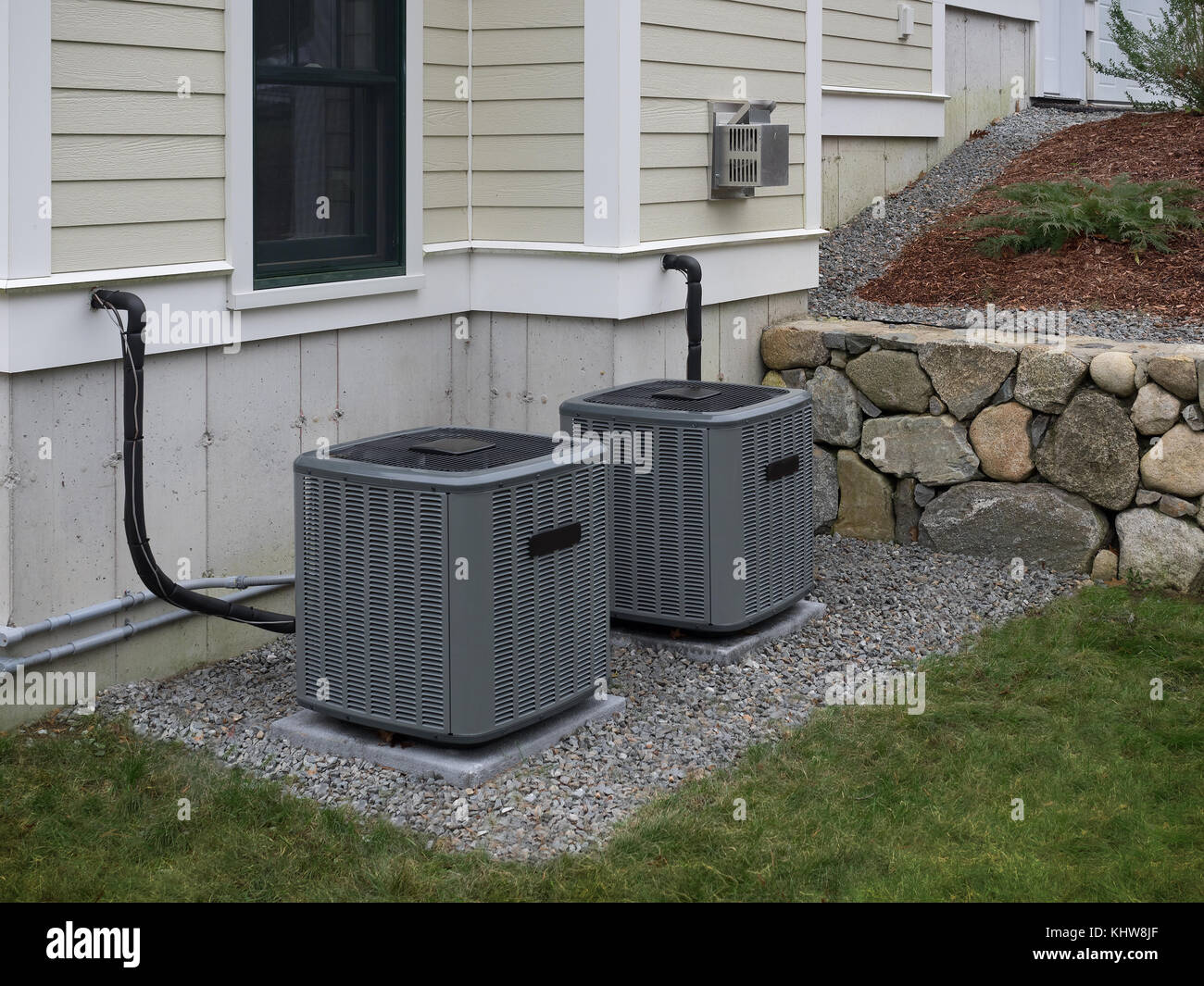 Heating and air conditioning units used to heat and cool a house Stock ...