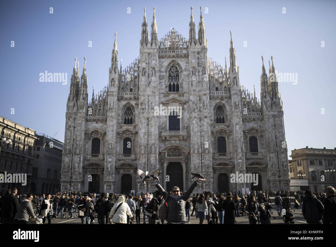 Milan, Italy. 19th Nov, 2017. A tourist poses for a picture with ...