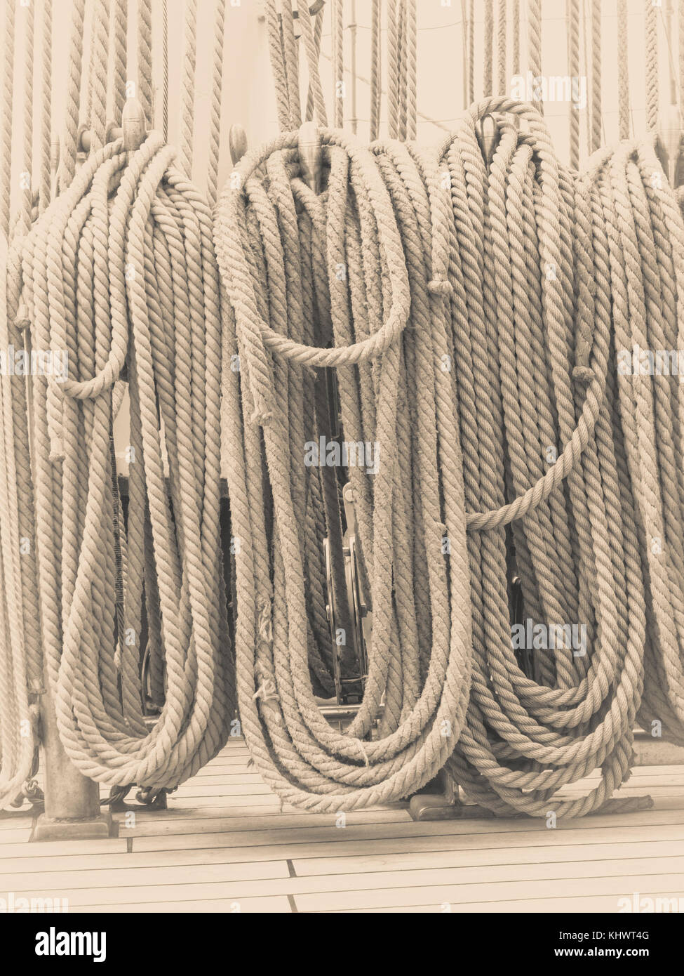 Old fashioned harbor marina sail boat ropes. Yachting details and ...