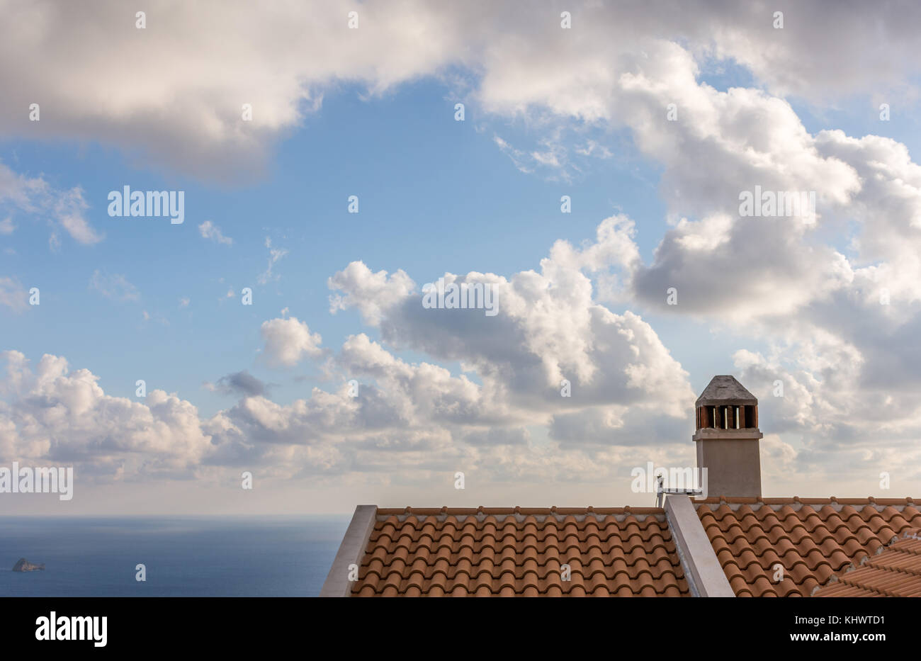 Traditional Greek tiled roof with sea view. Copy space Stock Photo - Alamy