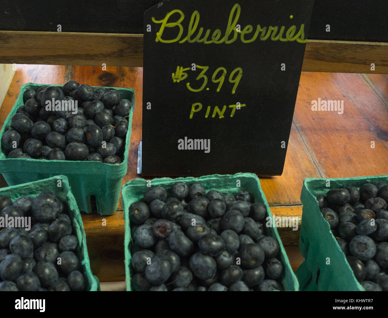 Pints of Fresh Blueberries for sale at the farmers market Stock Photo ...