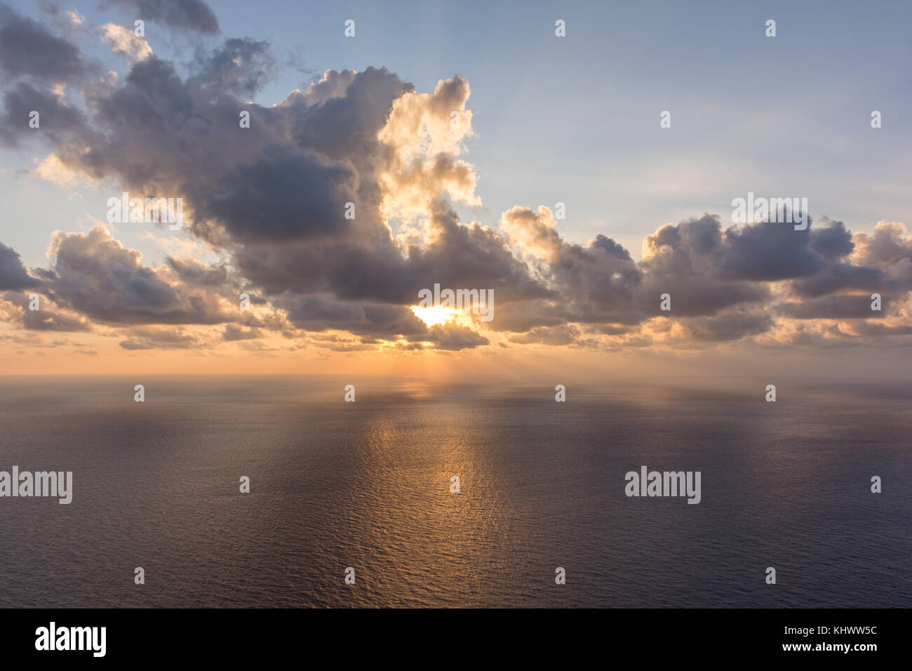 Amazing sunset between the clouds Stock Photo - Alamy