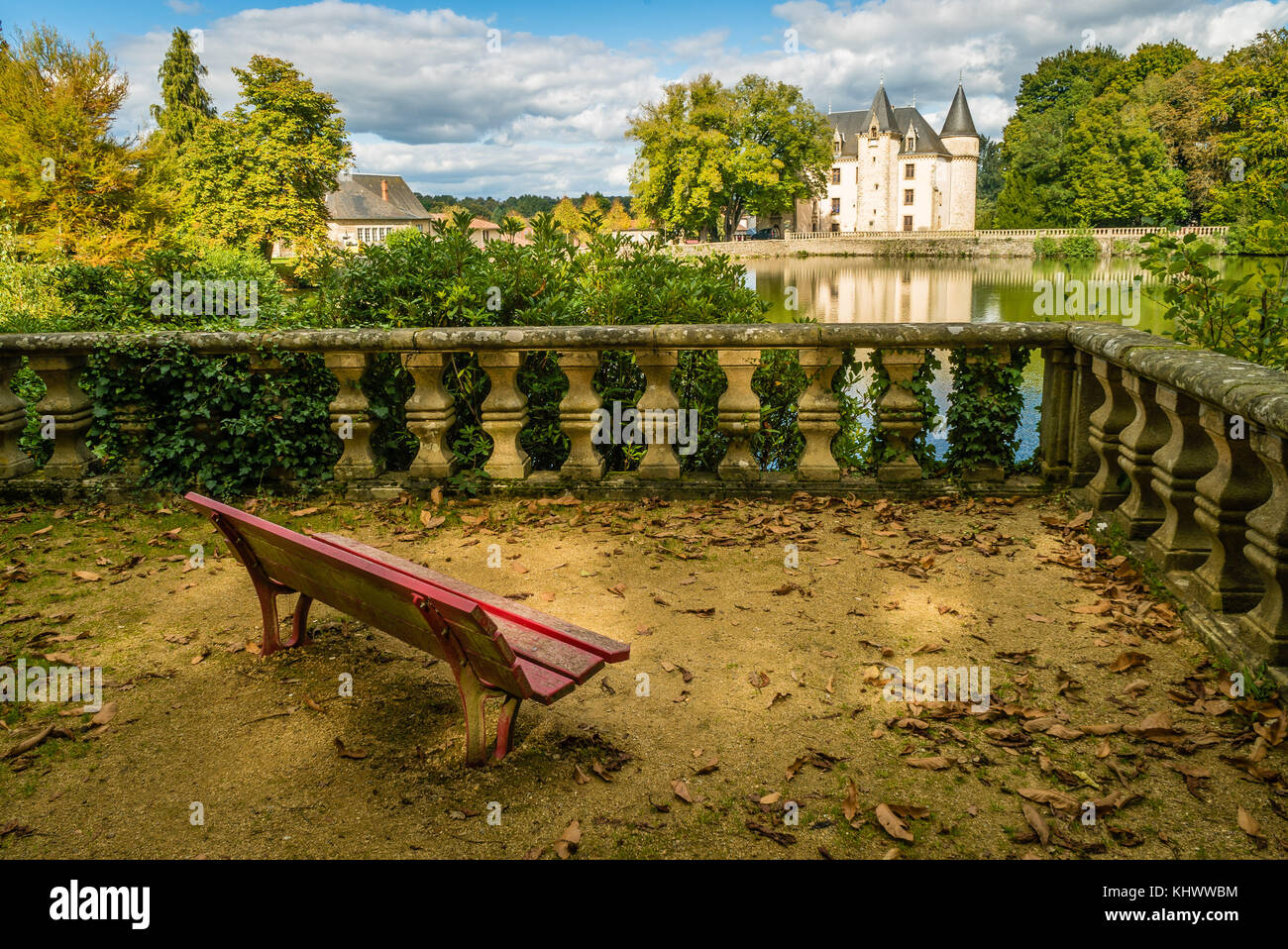 Nieul castle in France and its park and lake and a bench to enjoy the ...