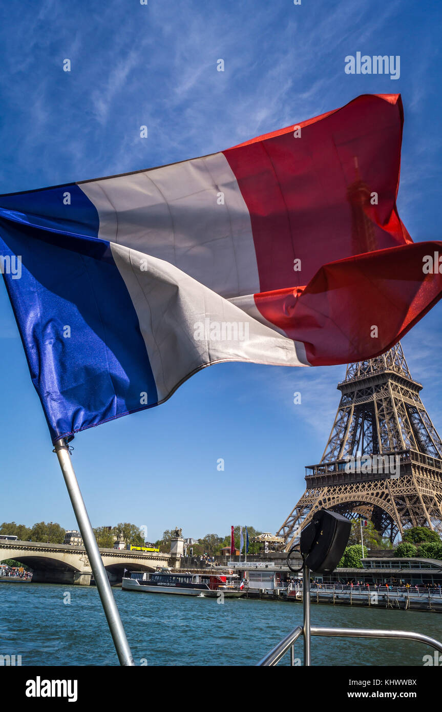 French flag floating in front of the eiffel tower on a boat Stock Photo ...