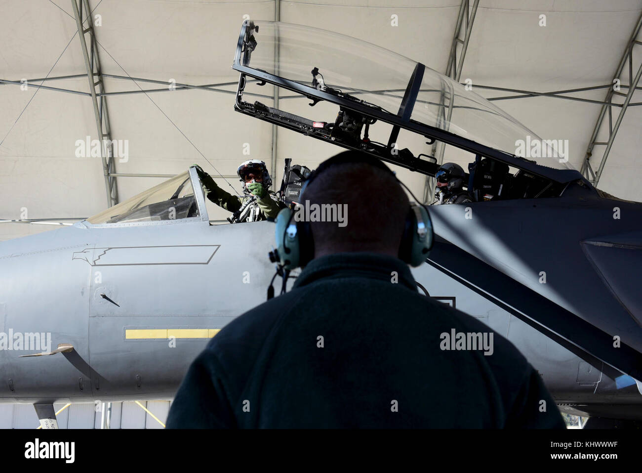 An F-15E Strike Eagle pilot and weapon systems operator with the 335th ...