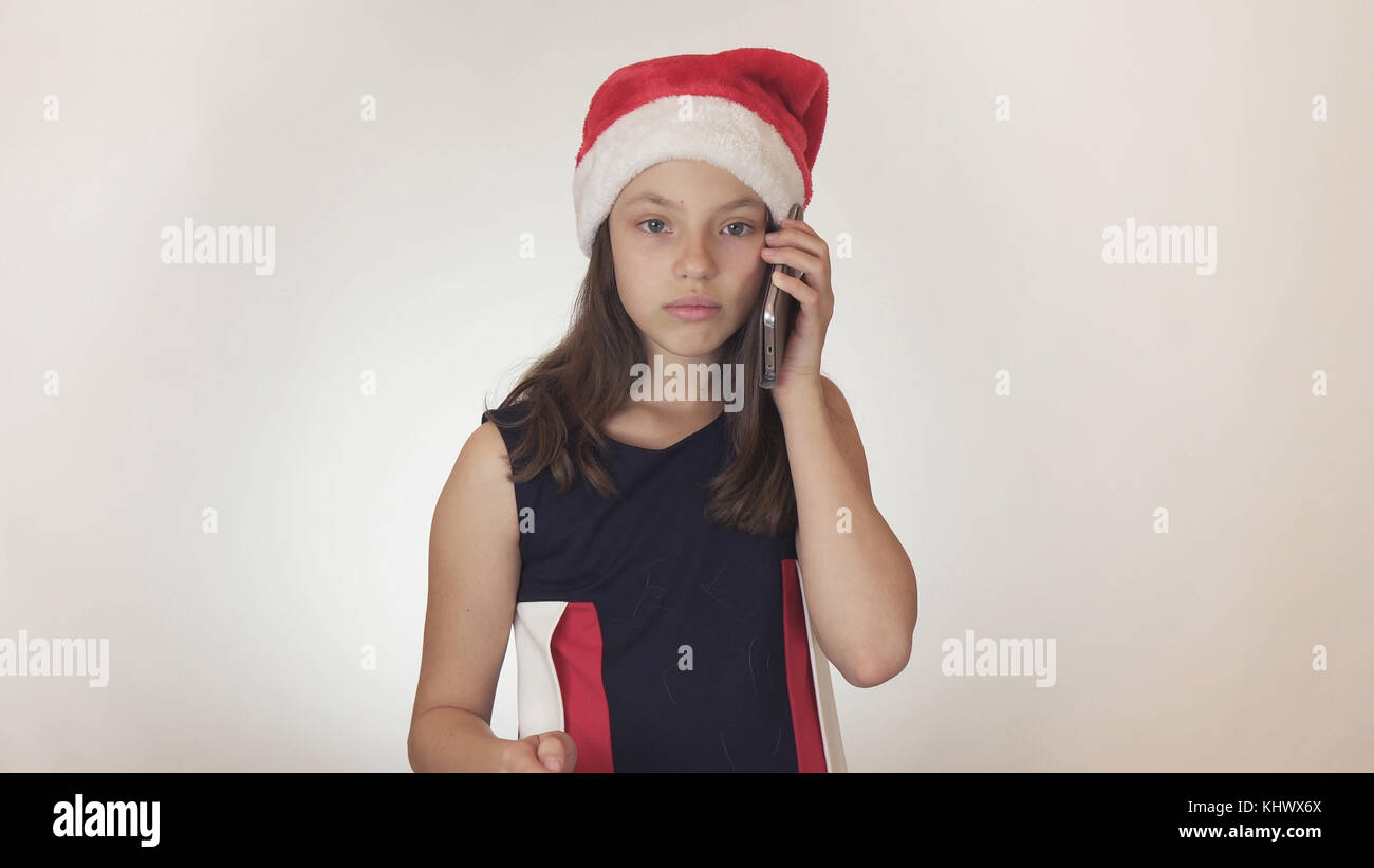 Beautiful Naughty Girl Teenager In A Santa Claus Hat Emotionally 6257