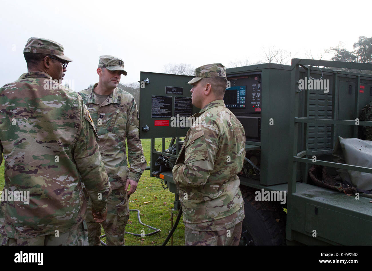 U.S. Army Reserve Capt. Anthony Smith, center, operations officer ...