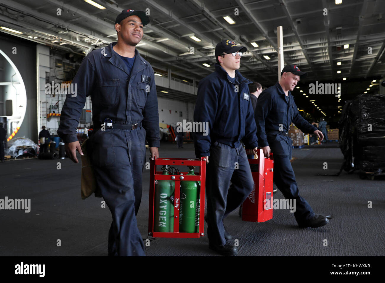 NORFOLK (Nov. 14, 2017) Sailors transport liquid oxygen in the hangar ...