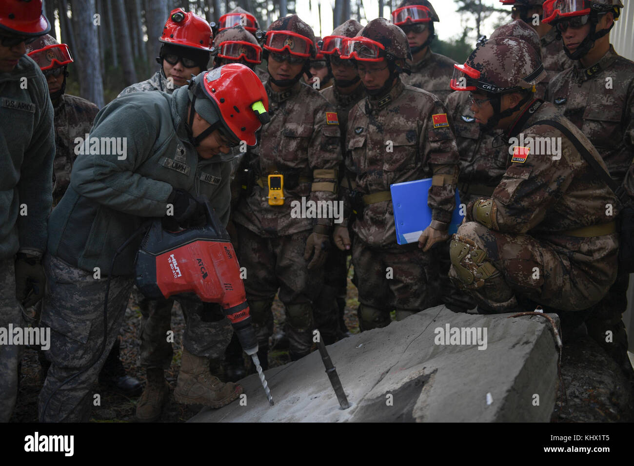 Participants apply struts to a building during the 2017 U.S. – China ...