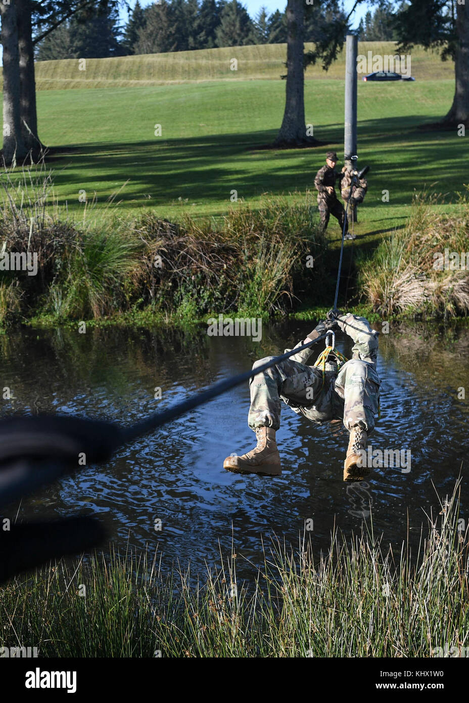 Participants use a one-rope bridge during the 2017 U.S. – China ...
