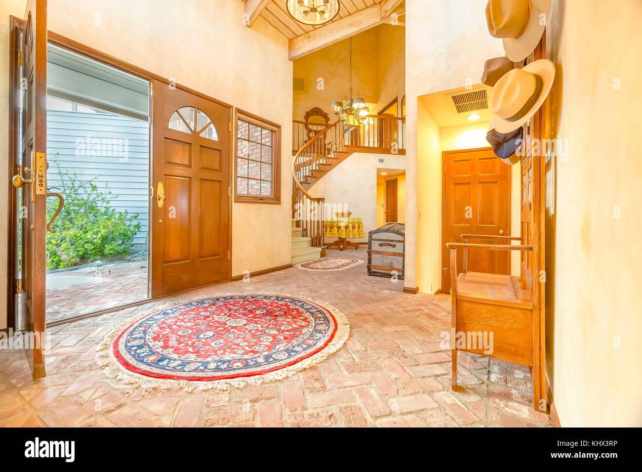 Beautiful entry, foyer, and living room interior in new luxury home ...