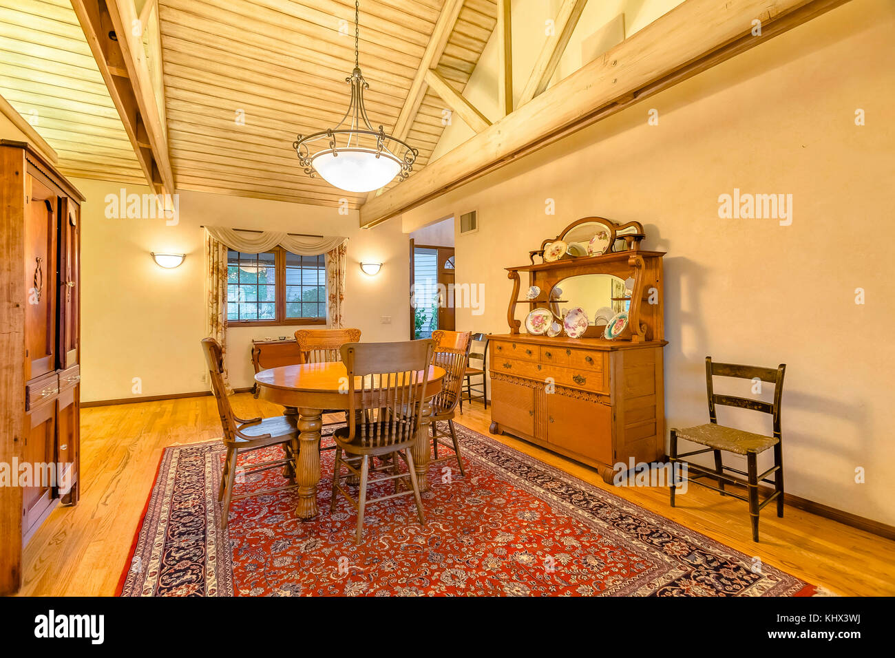 Bright, open and warm dining room with vaulted ceilings. Wonderful ...