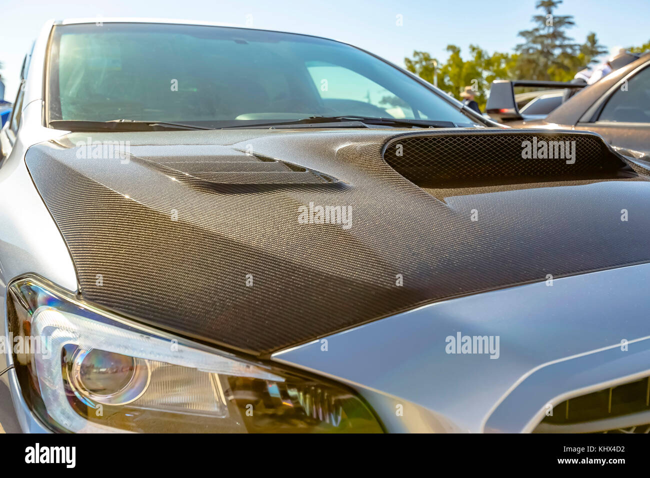 Carbon fiber hood on a white car. Custom cars in Southern California ...