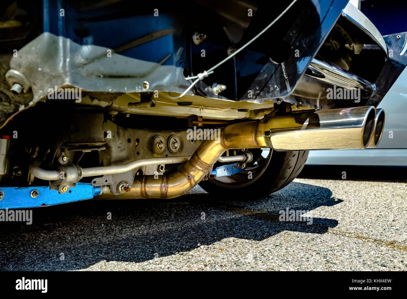 Chrome double exhaust pipe at the bottom of car. Various vehicle ...