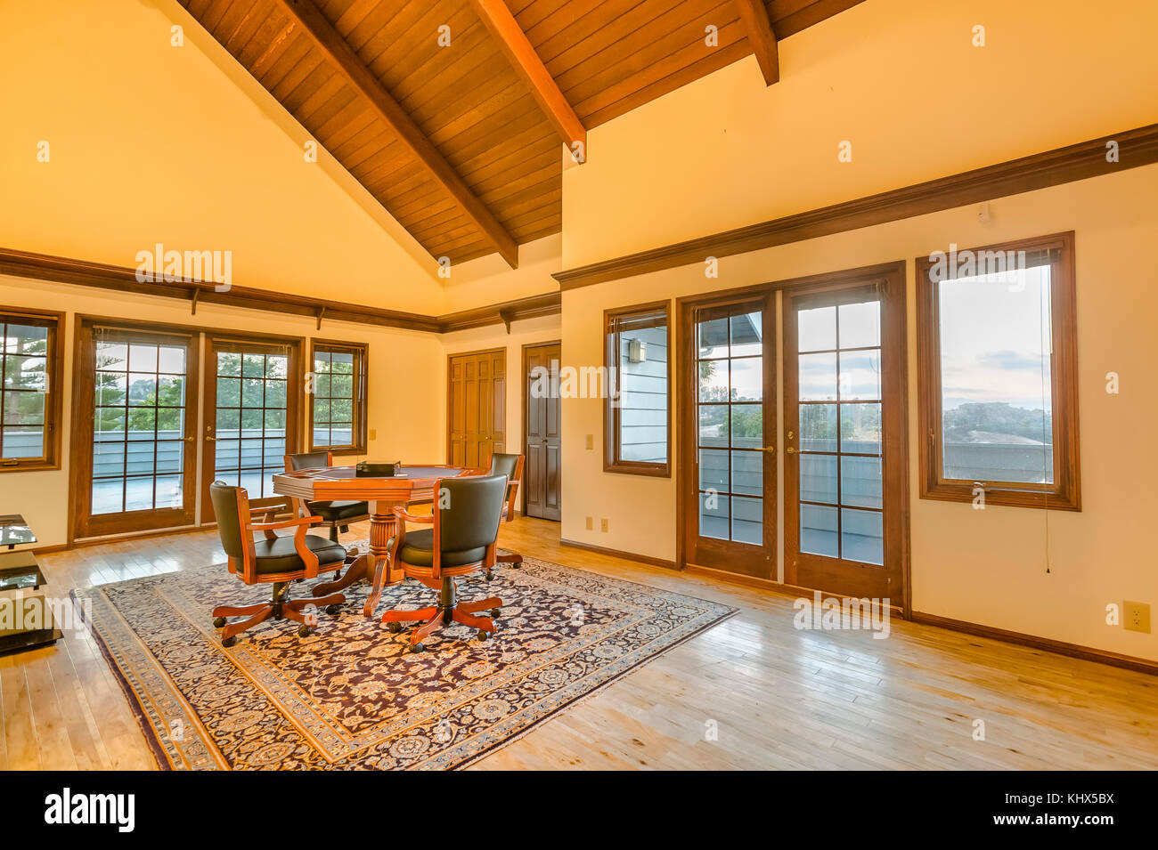 Spacious bonus room with two decks and beamed wooden ceiling. Wonderful ...