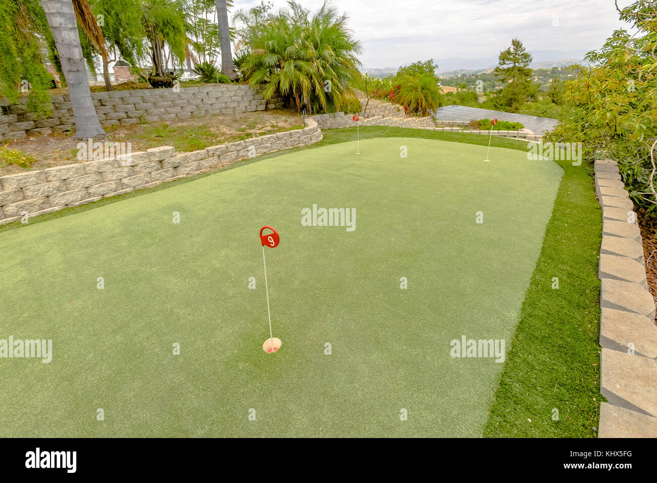 The golf course landscape with solar panels in the background. Great ...