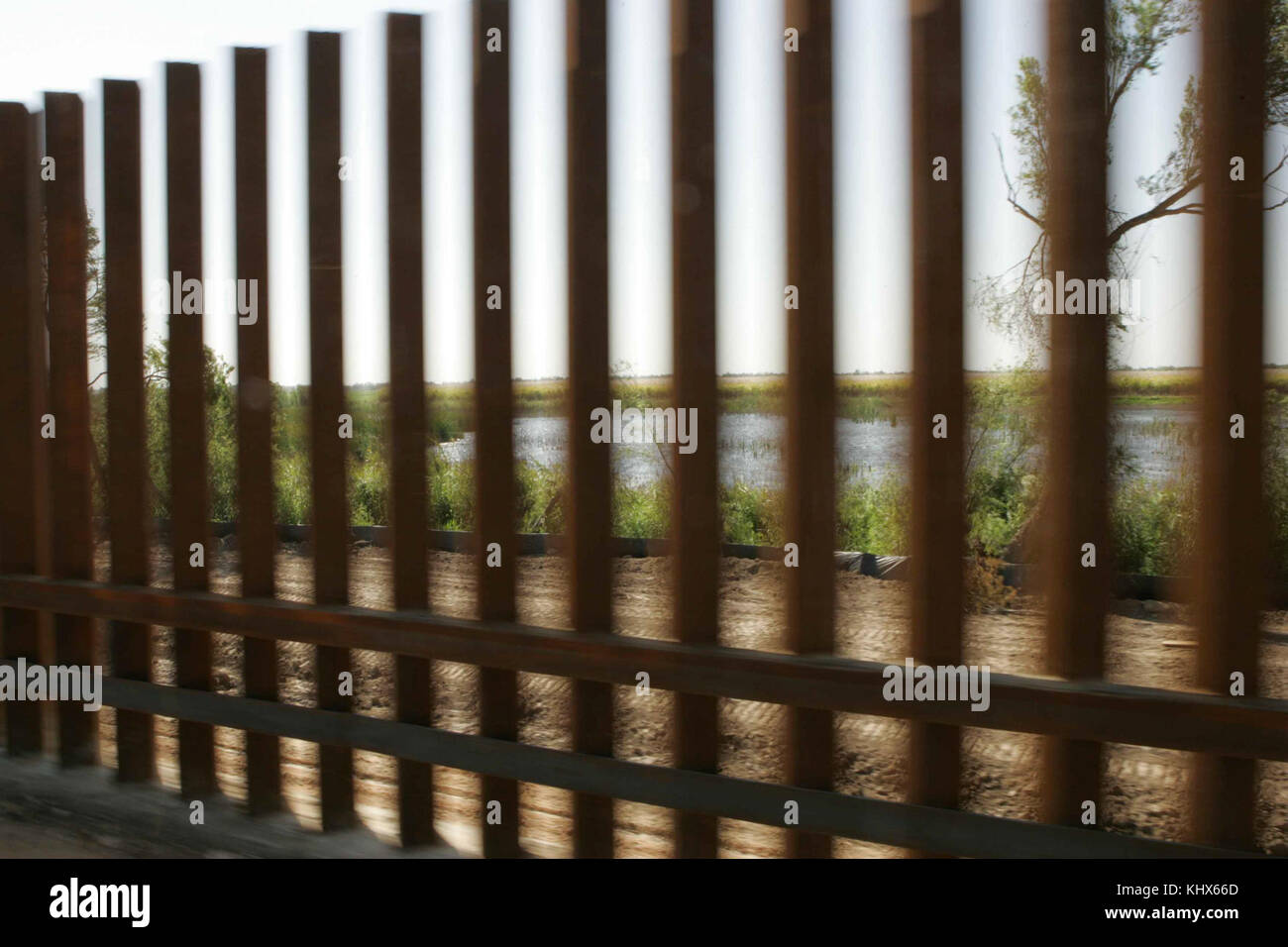 Close up snapshot of metal fence from moving vehicle Stock Photo - Alamy