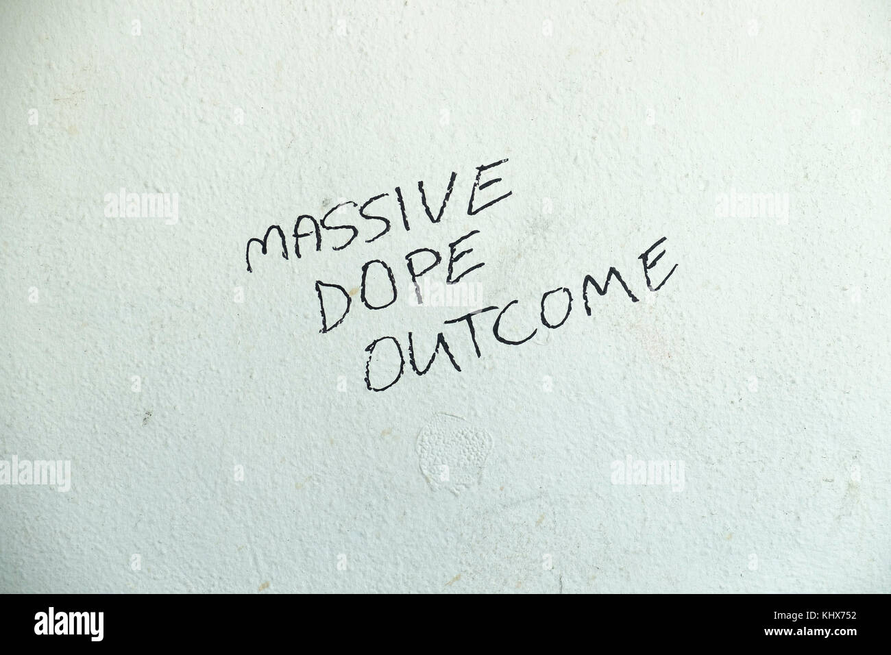 Graffiti scrawled written on a wall Stock Photo - Alamy
