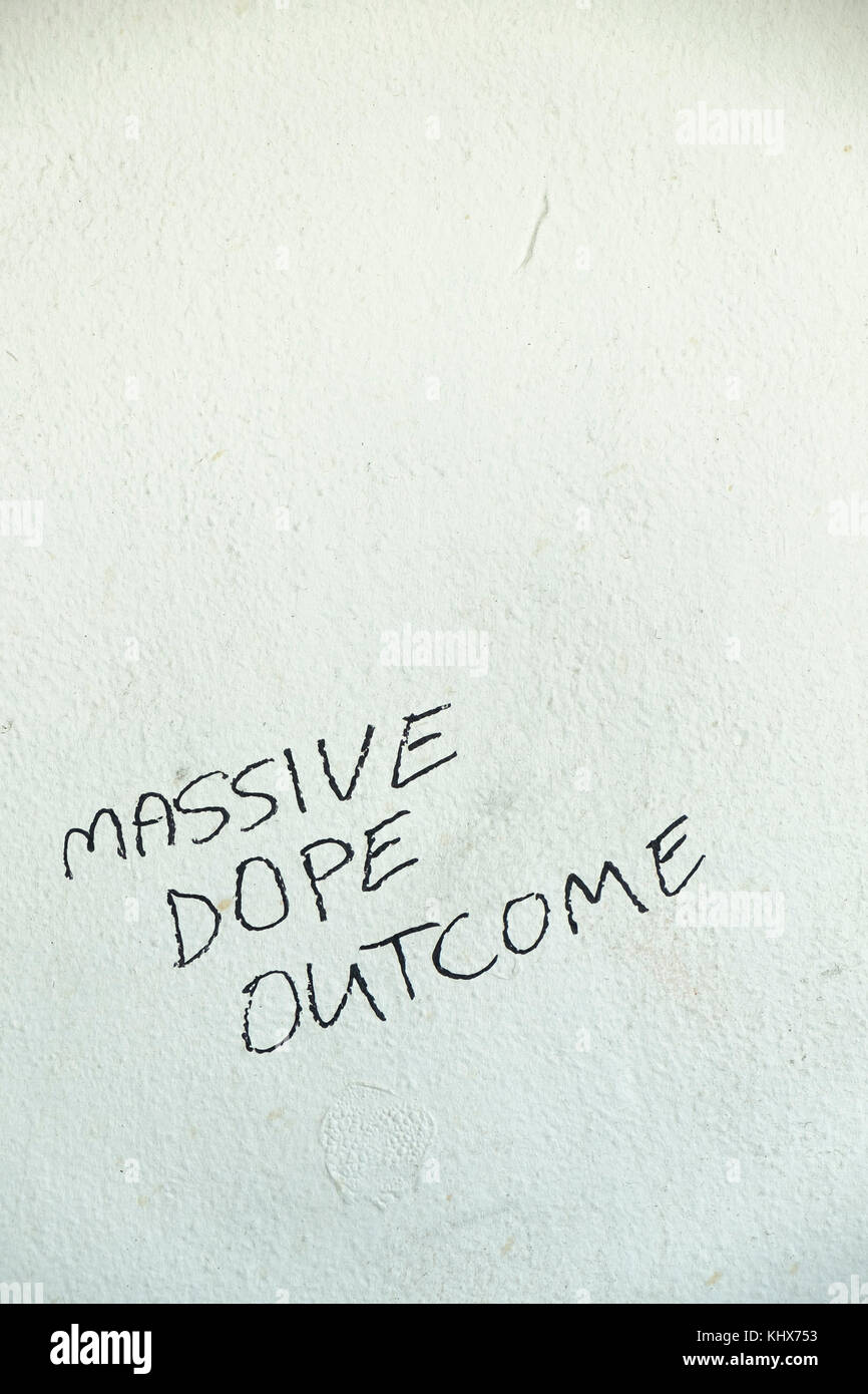 Graffiti scrawled written on a wall Stock Photo - Alamy