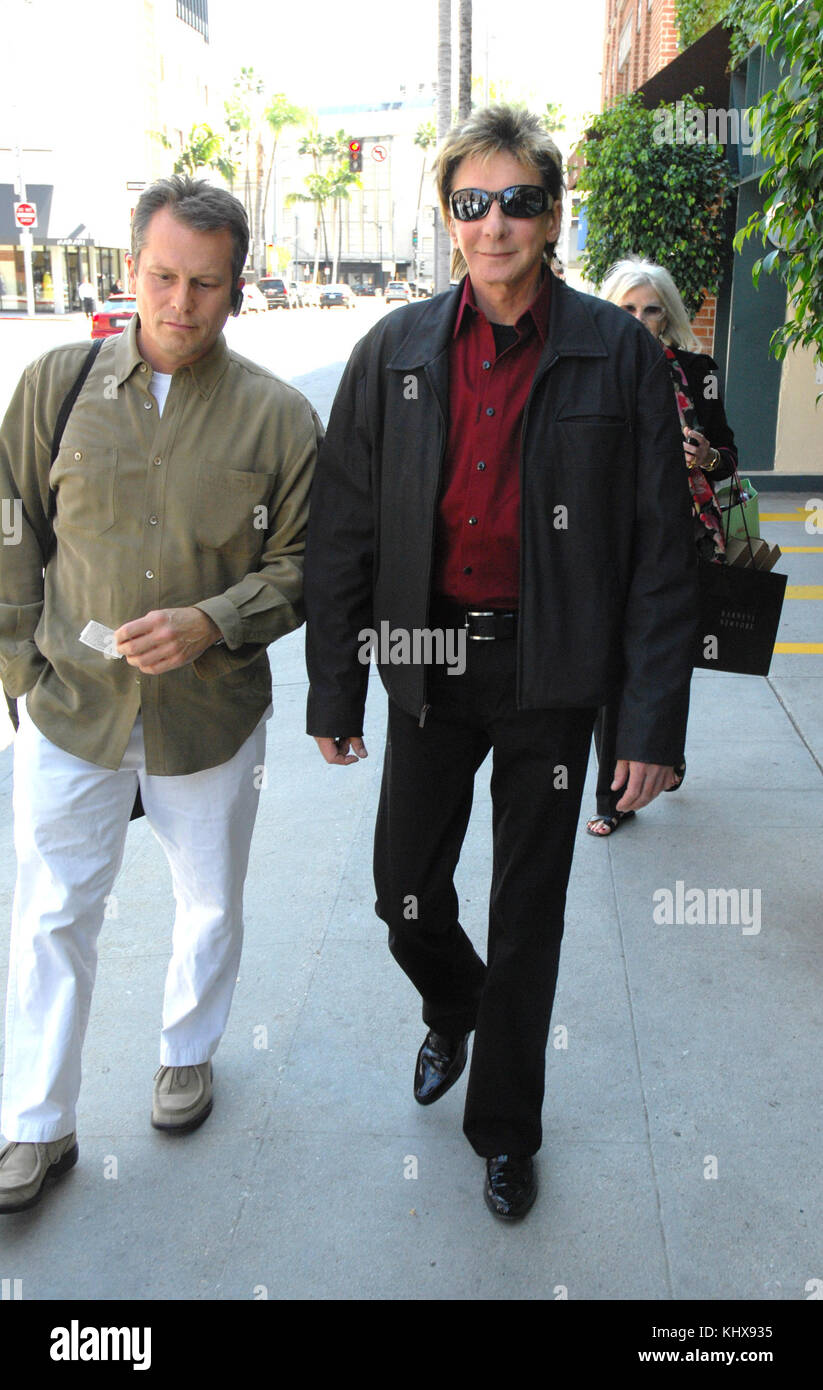 BEVERLY HILLS - CA - MARCH 22: Singer Barry Manilow & Gary Kief out and ...