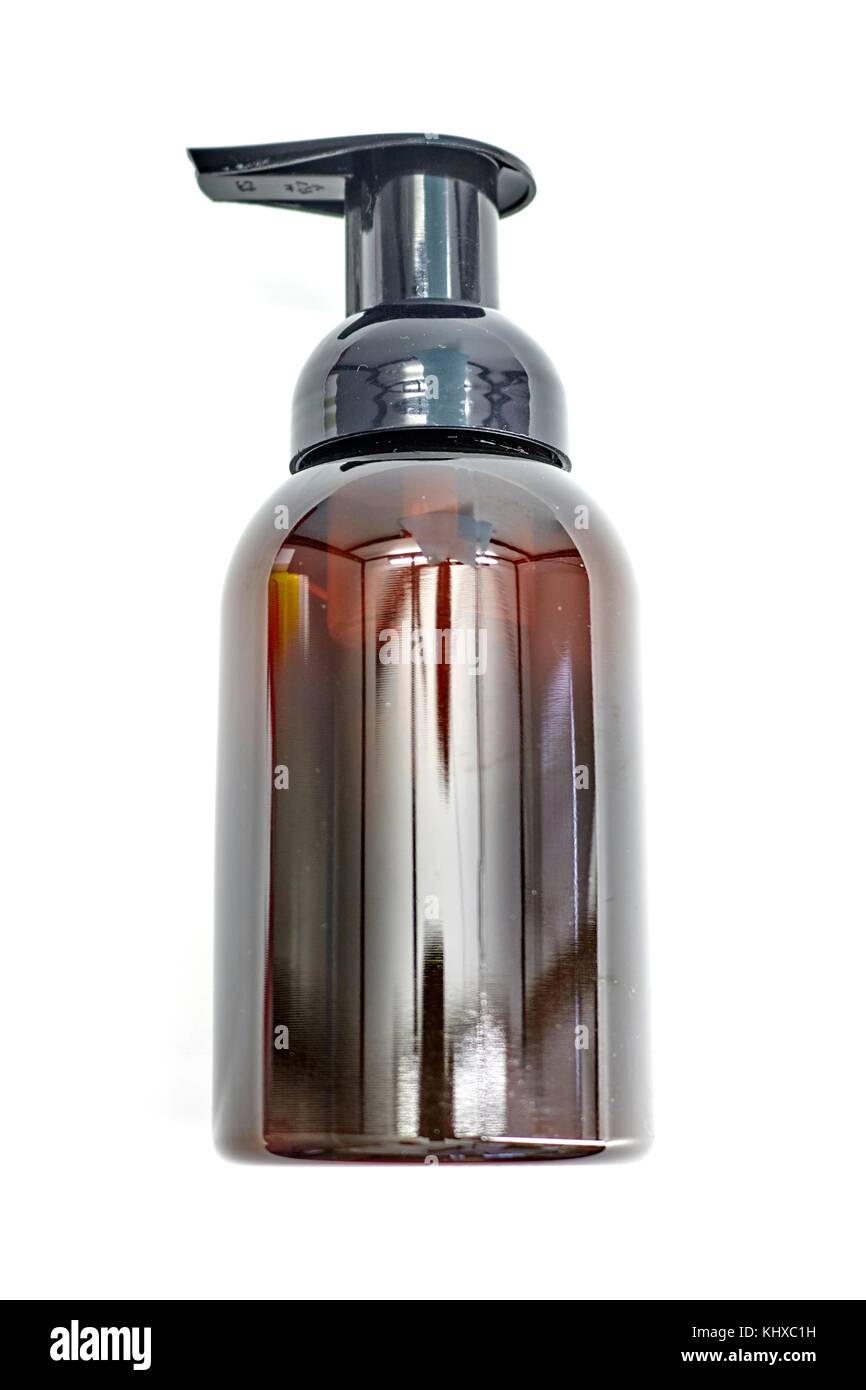 Dispenser bottle pouring liquid Cut Out Stock Images & Pictures - Alamy