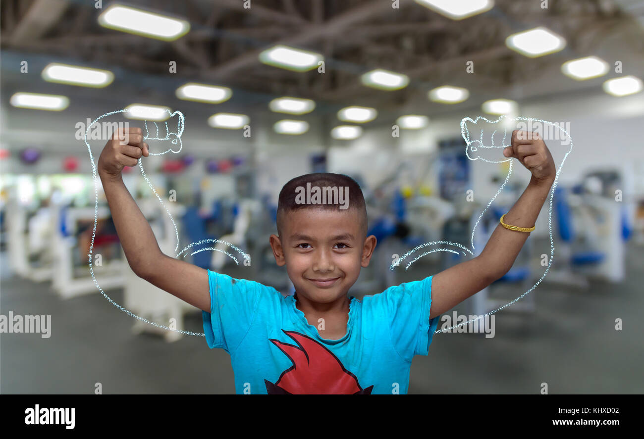 Asian strong children on Abstract blurred photo of fitness gym ...