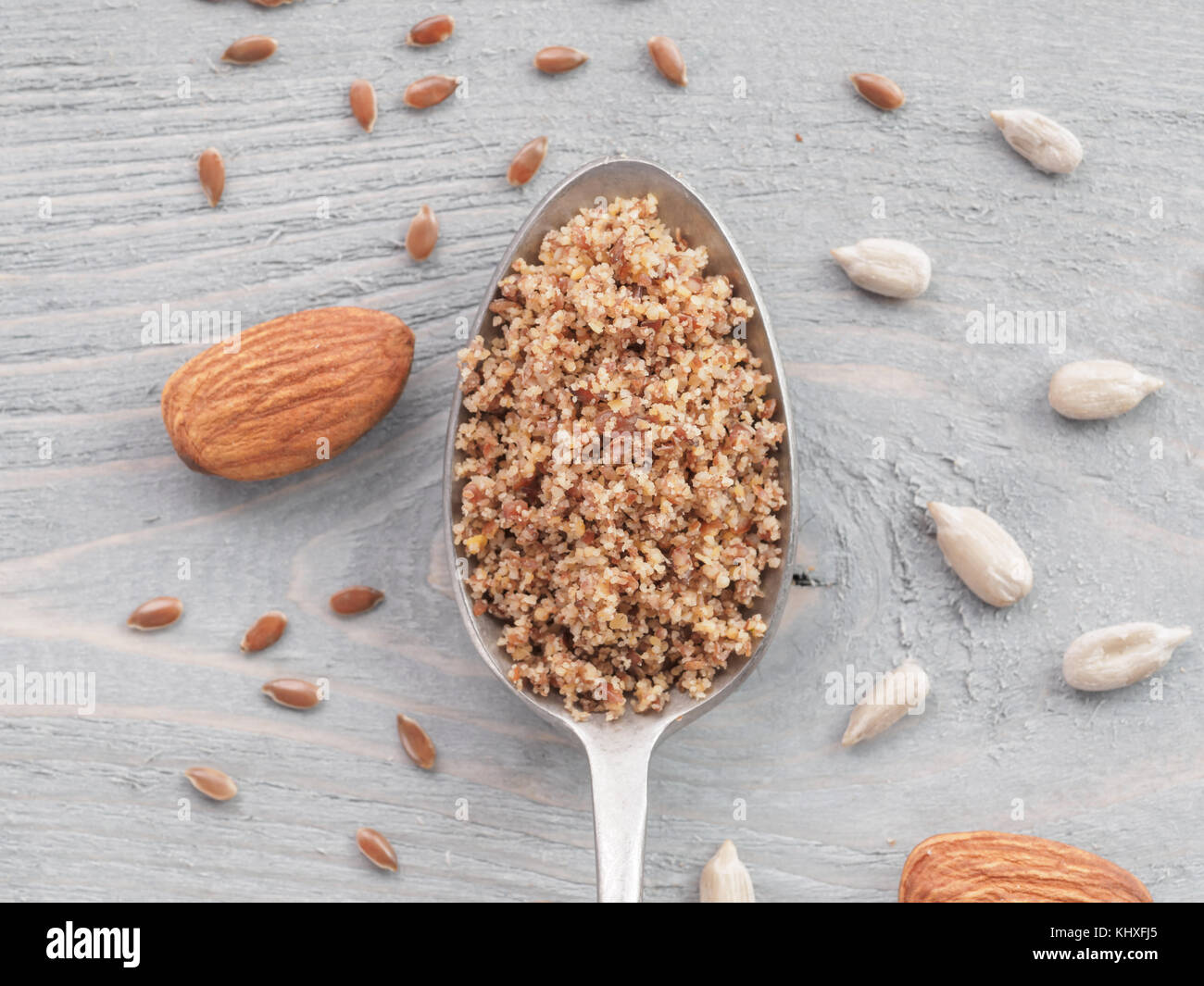 Homemade LSA mix in spoon - Linseed or flax seeds, Sunflower seeds and ...