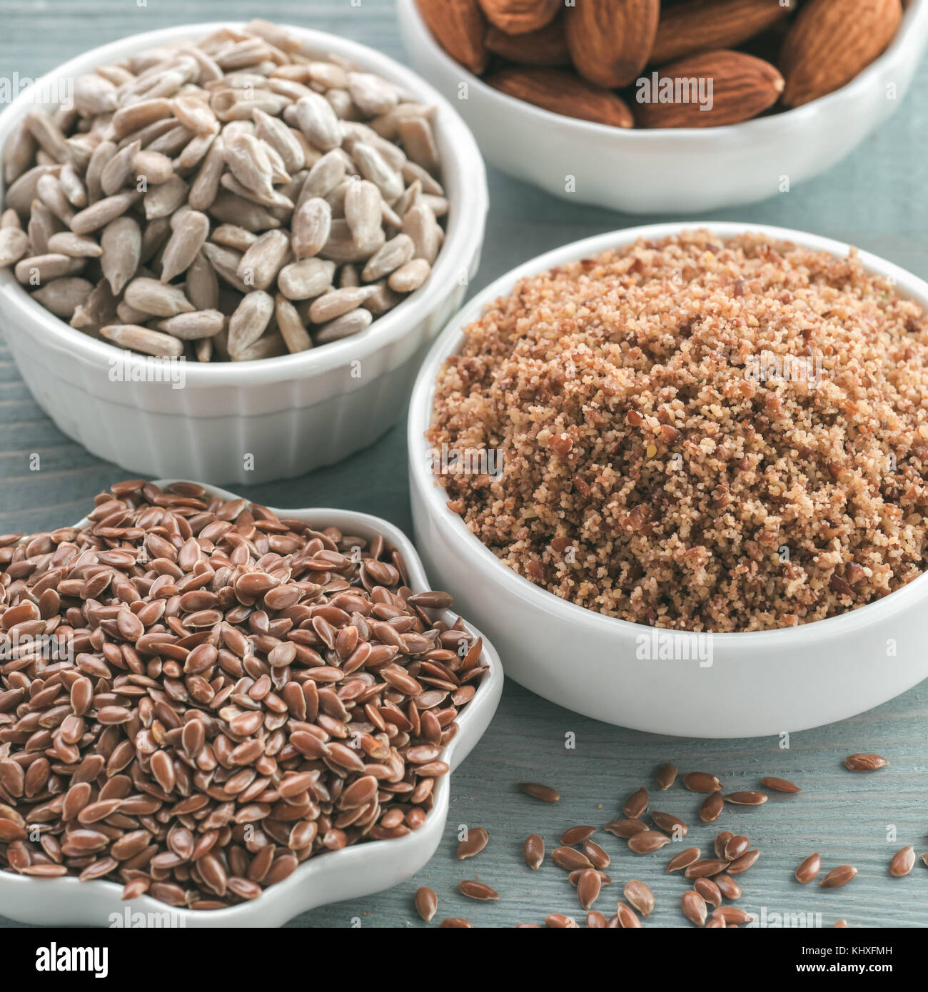 Homemade LSA mix in plate and Linseed or flax seeds, Sunflower seeds ...