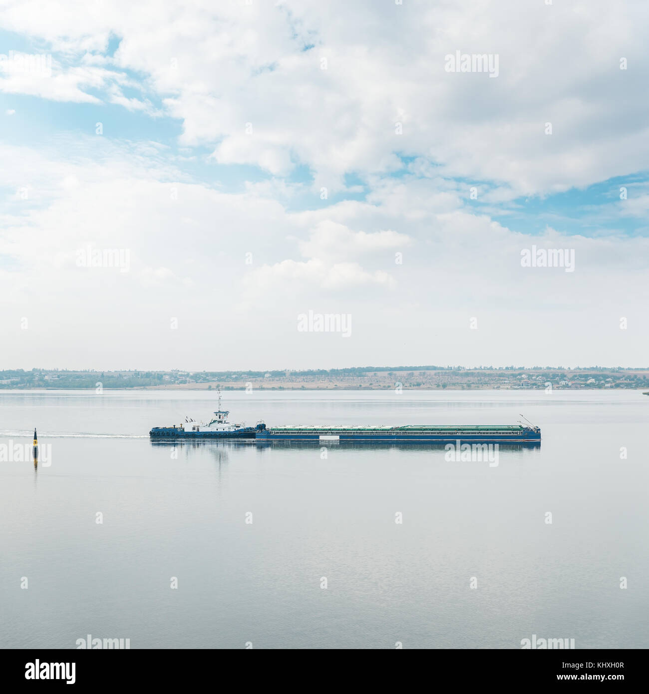 barge on river and clouds in sky Stock Photo - Alamy