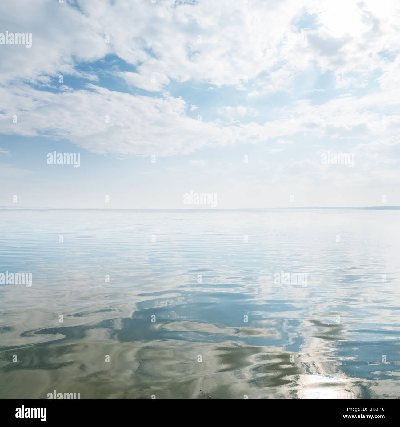 river closeup and reflections of clouds in water Stock Photo - Alamy