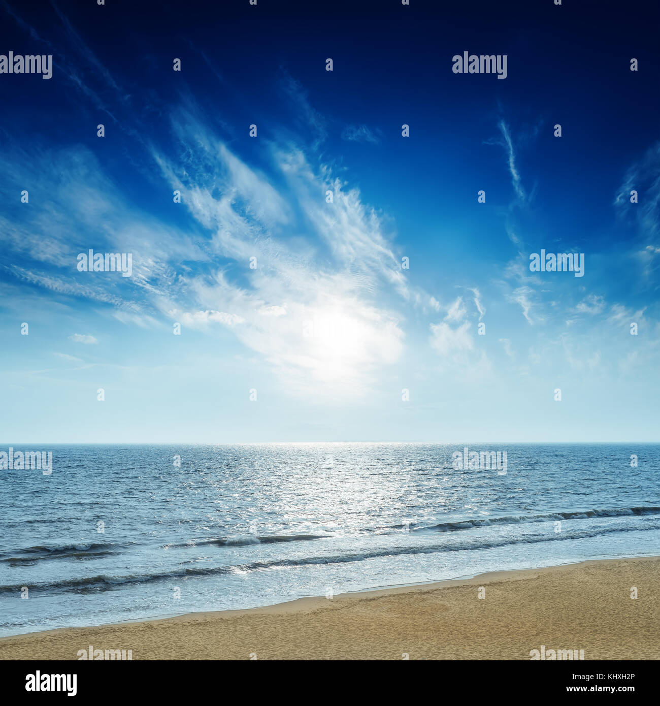 sunset in deep blue sky over sea Stock Photo - Alamy