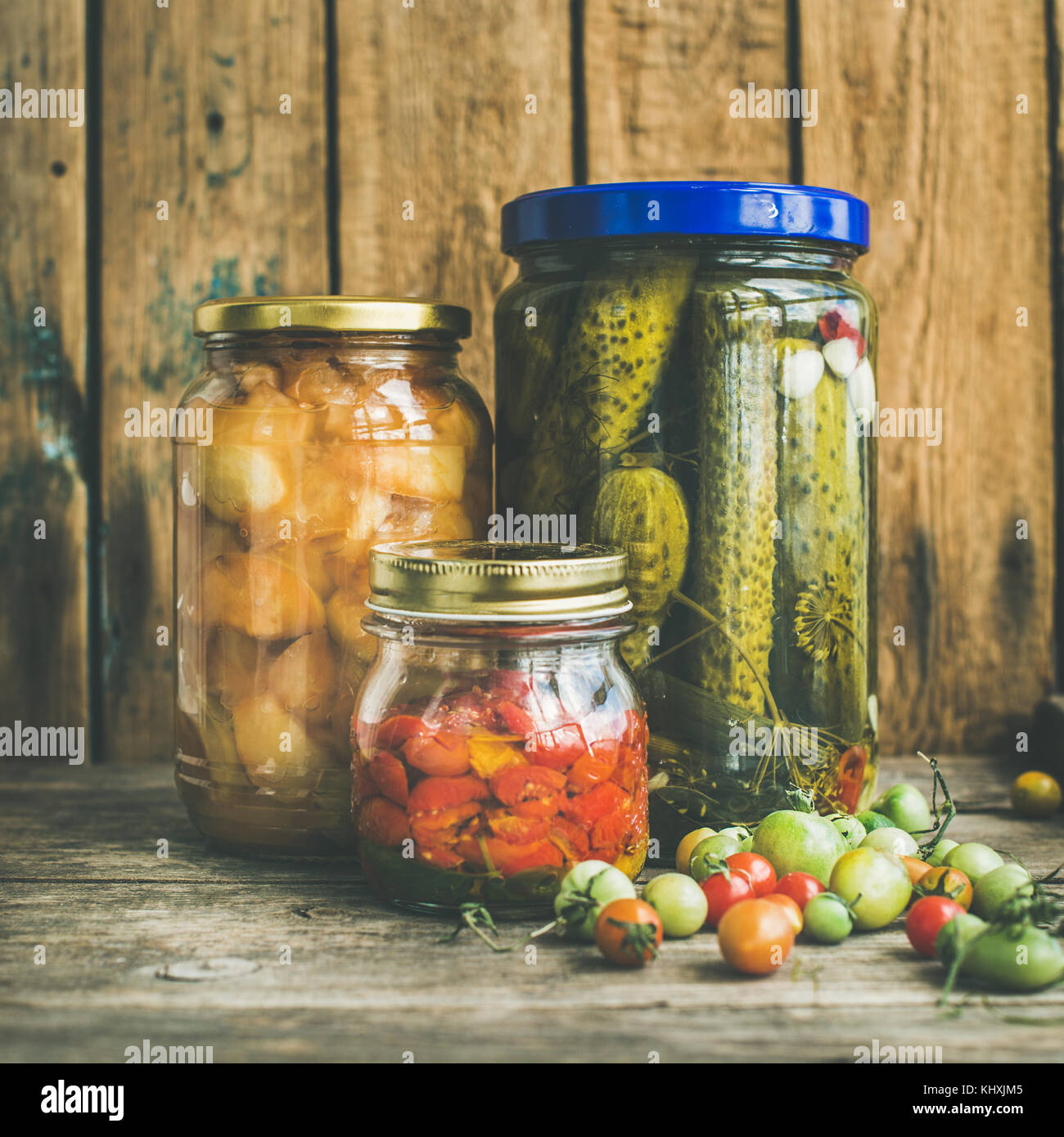 Autumn seasonal pickled vegetables and fruit in jars, square crop Stock ...