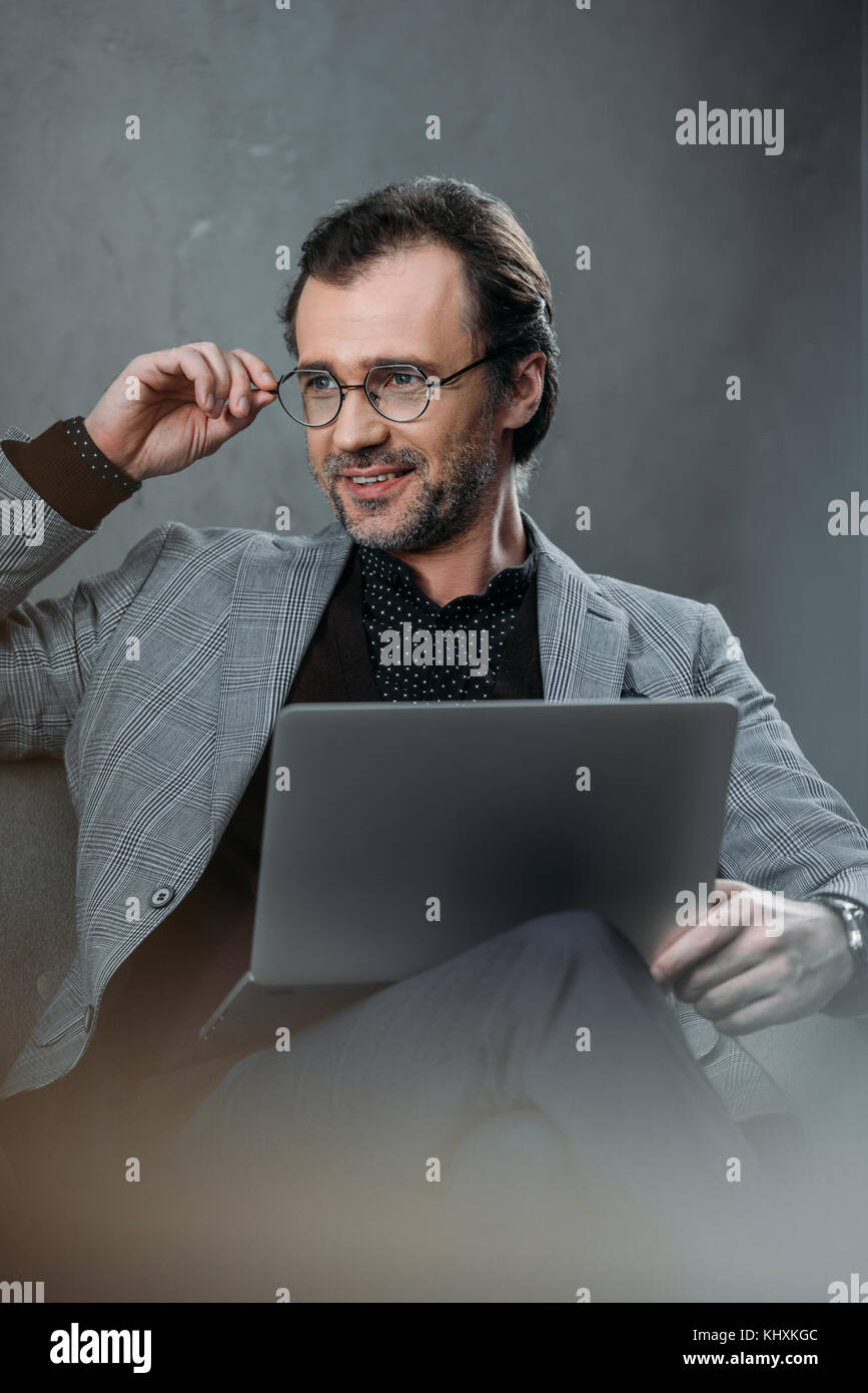 businessman using laptop Stock Photo - Alamy