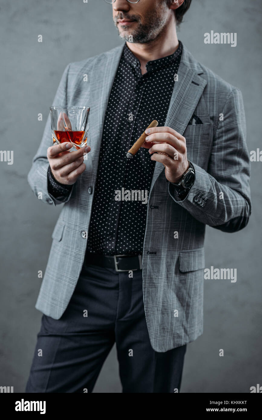 businessman drinking whiskey Stock Photo - Alamy