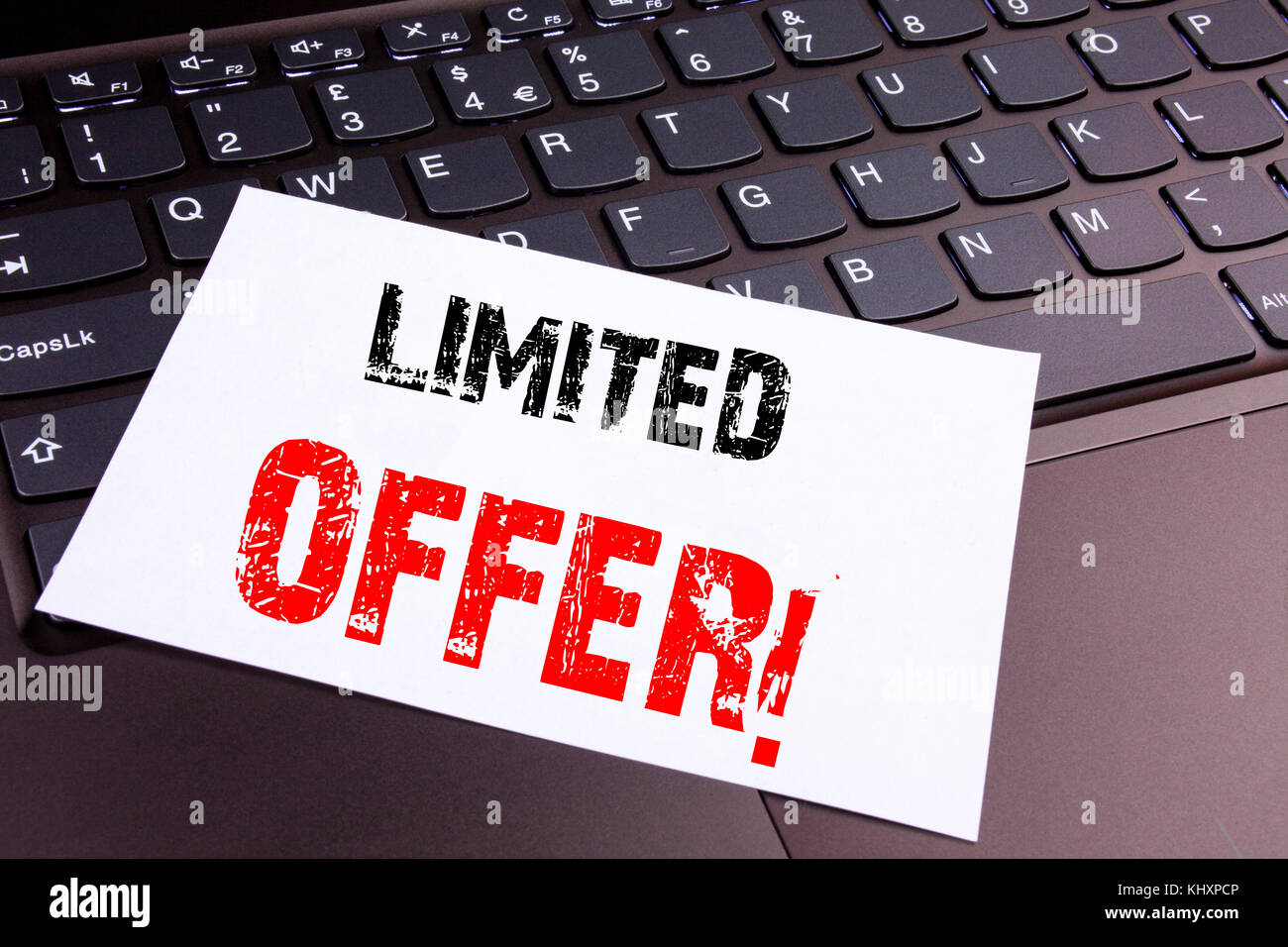 Writing Limited Offer text made in the office close-up on laptop ...