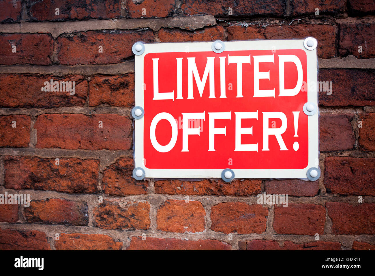 Hand writing text caption inspiration showing Limited Offer concept ...