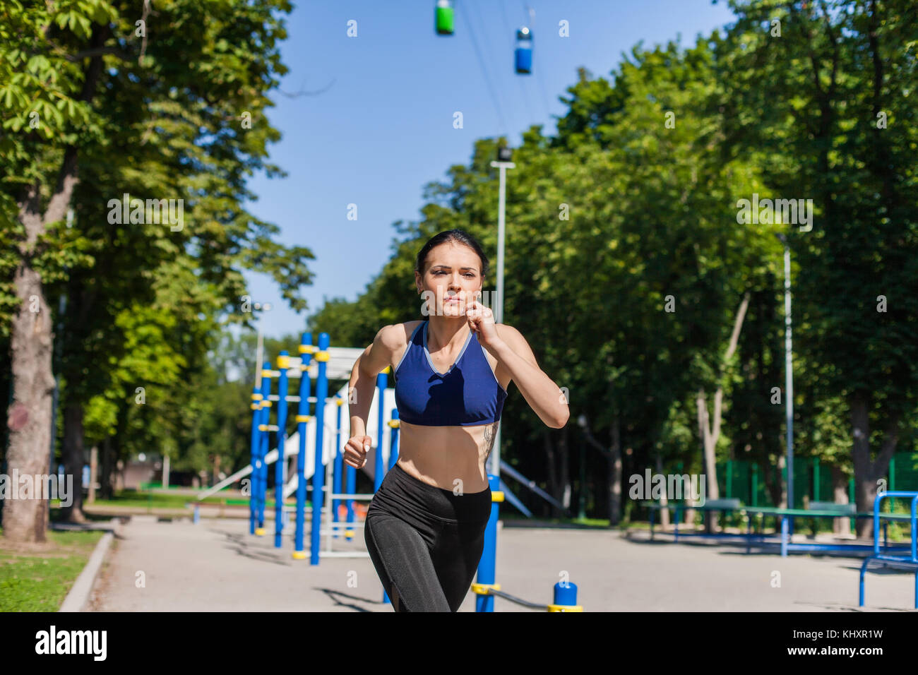 healthy woman running on the sport playground Stock Photo - Alamy