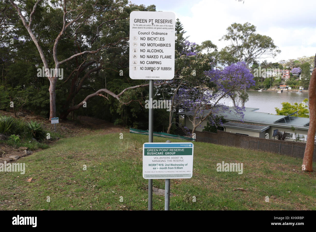 Signs at the entrance to Green Point Reserve in the suburb of Oyster ...