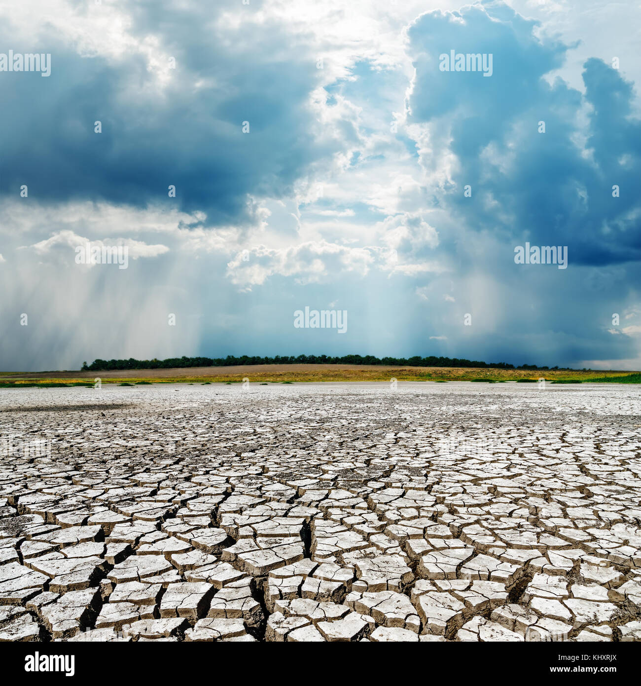 dramatic clouds over desert. rain before Stock Photo - Alamy