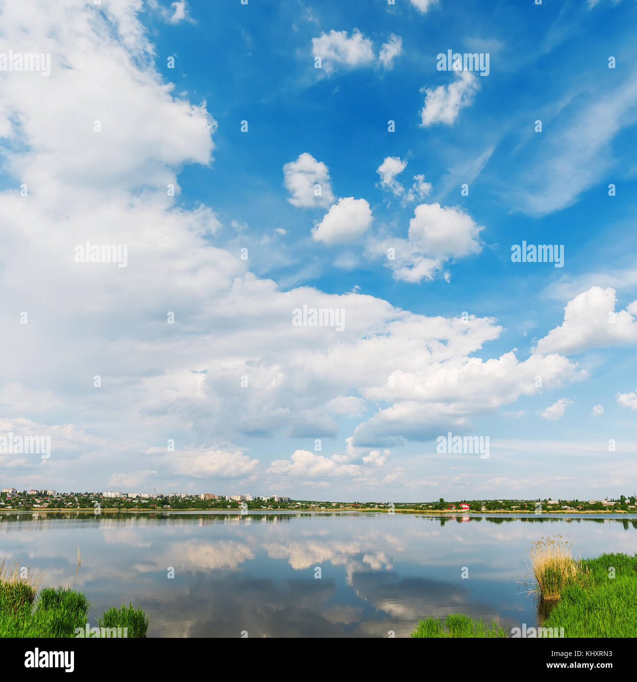 blue sky with clouds and reflections it in river Stock Photo - Alamy
