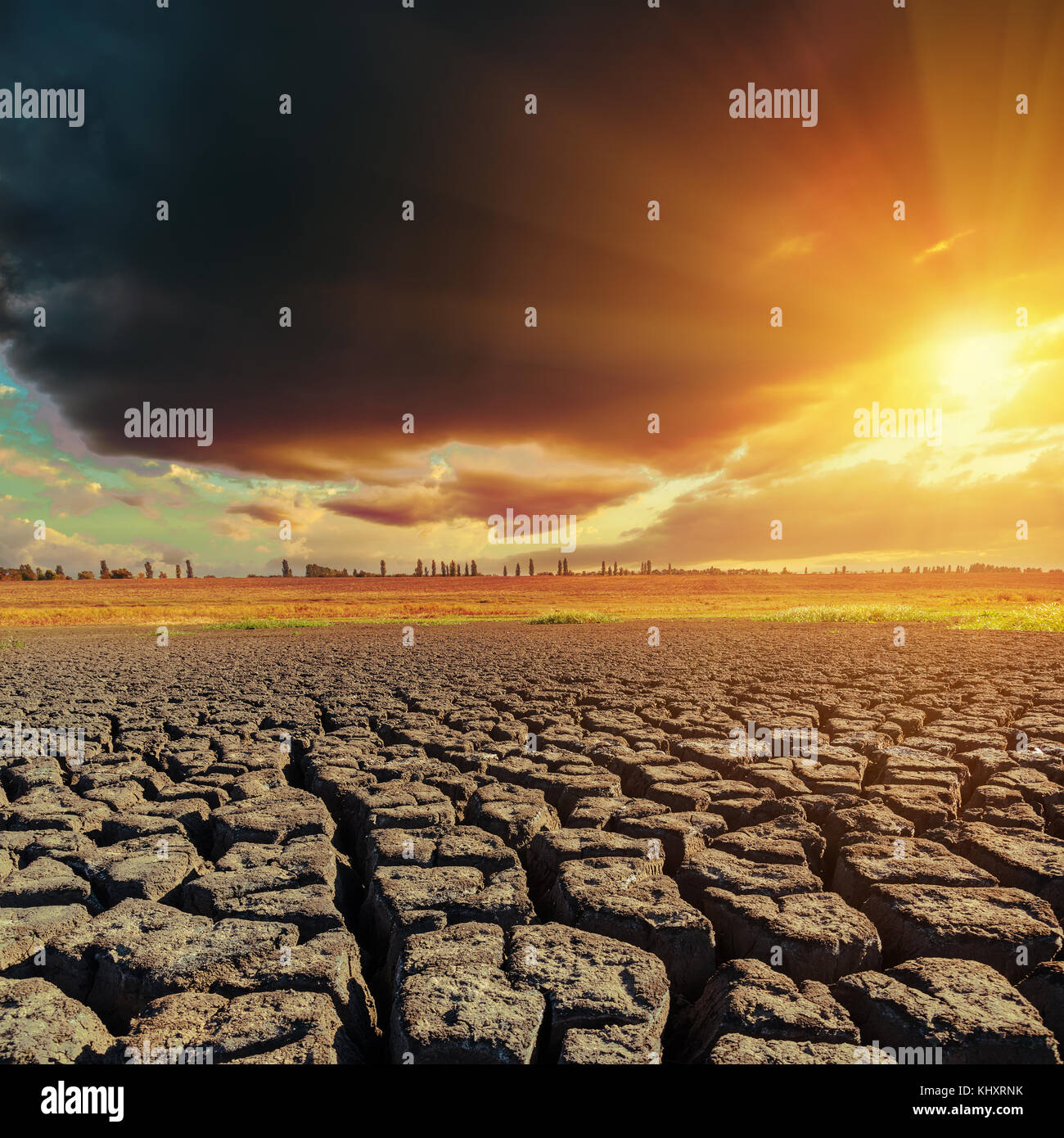dramatic red sunset over desert Stock Photo - Alamy