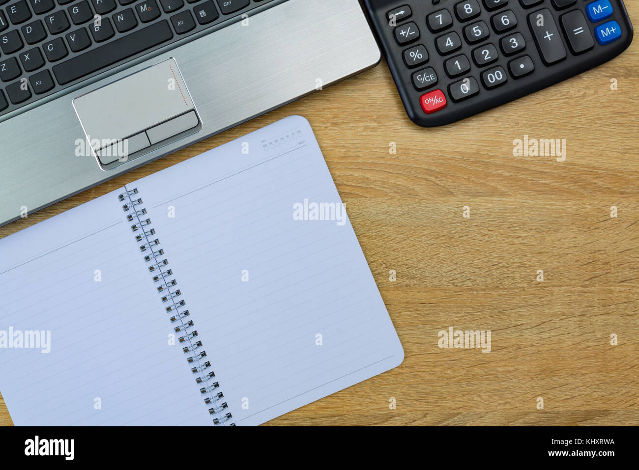 Laptop computer or notebook and other device, calculator and note on ...